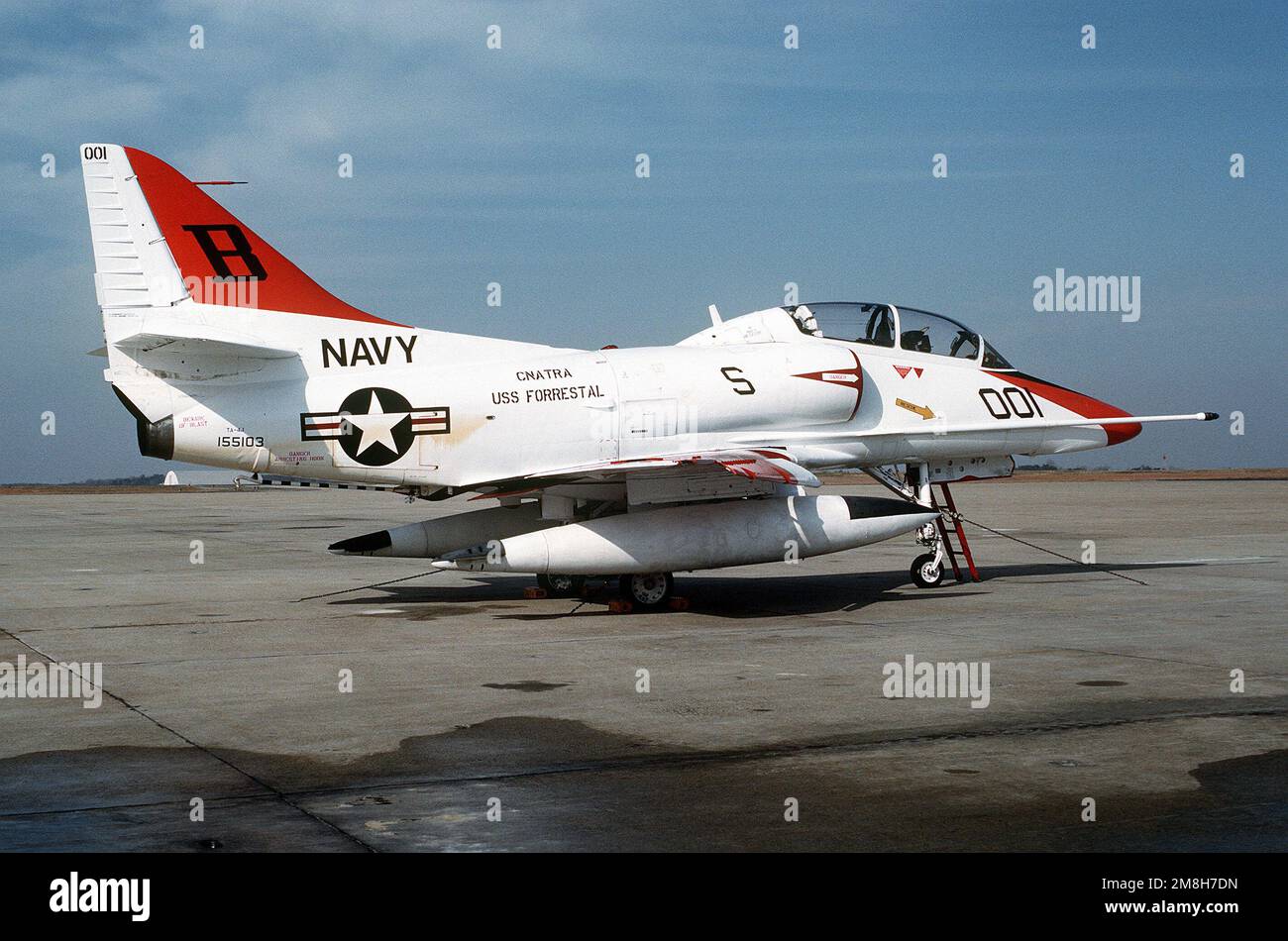 A right side view of a Training Wing 2 TA-4J Skyhawk aircraft parked on ...