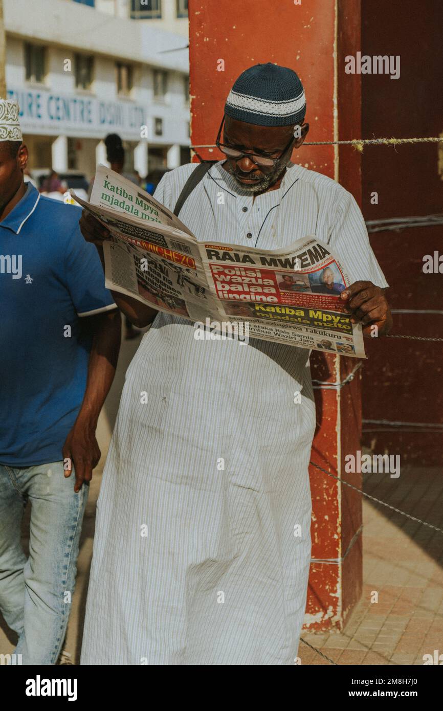 25th of March - Mwanza, Tanzania - Local man with glasses, curiously ...