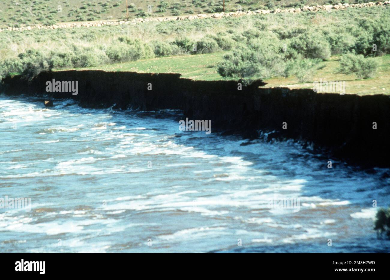 An overview of erosion caused by the flooding at Painted Rock Dam. The ...
