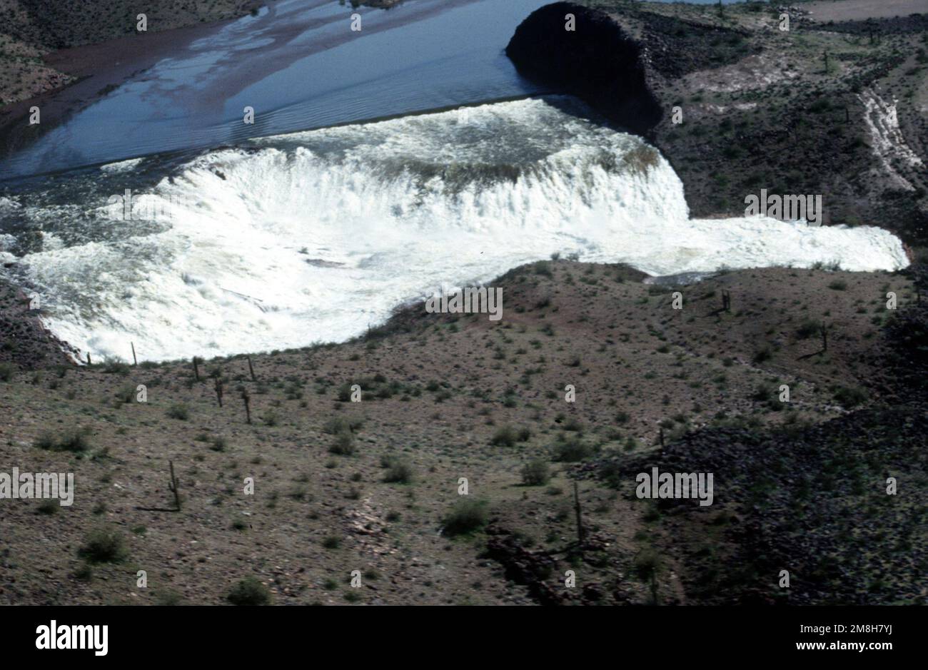 An aerial view of Painted Rock Dam as the waterse of the Gila River go ...