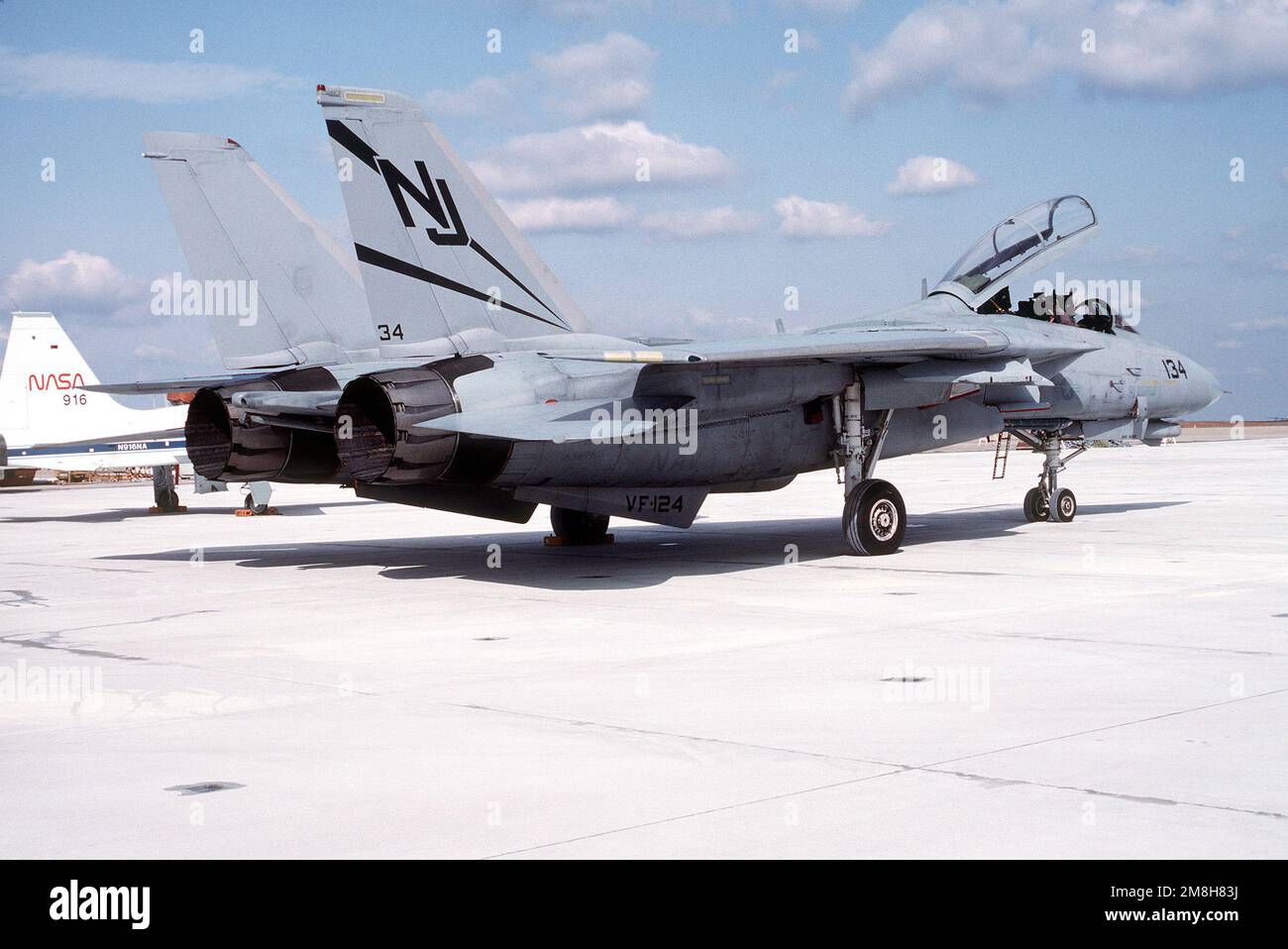 A right rear view of a Fighter Squadron 124 (VF-124) F-14D Tomcat ...
