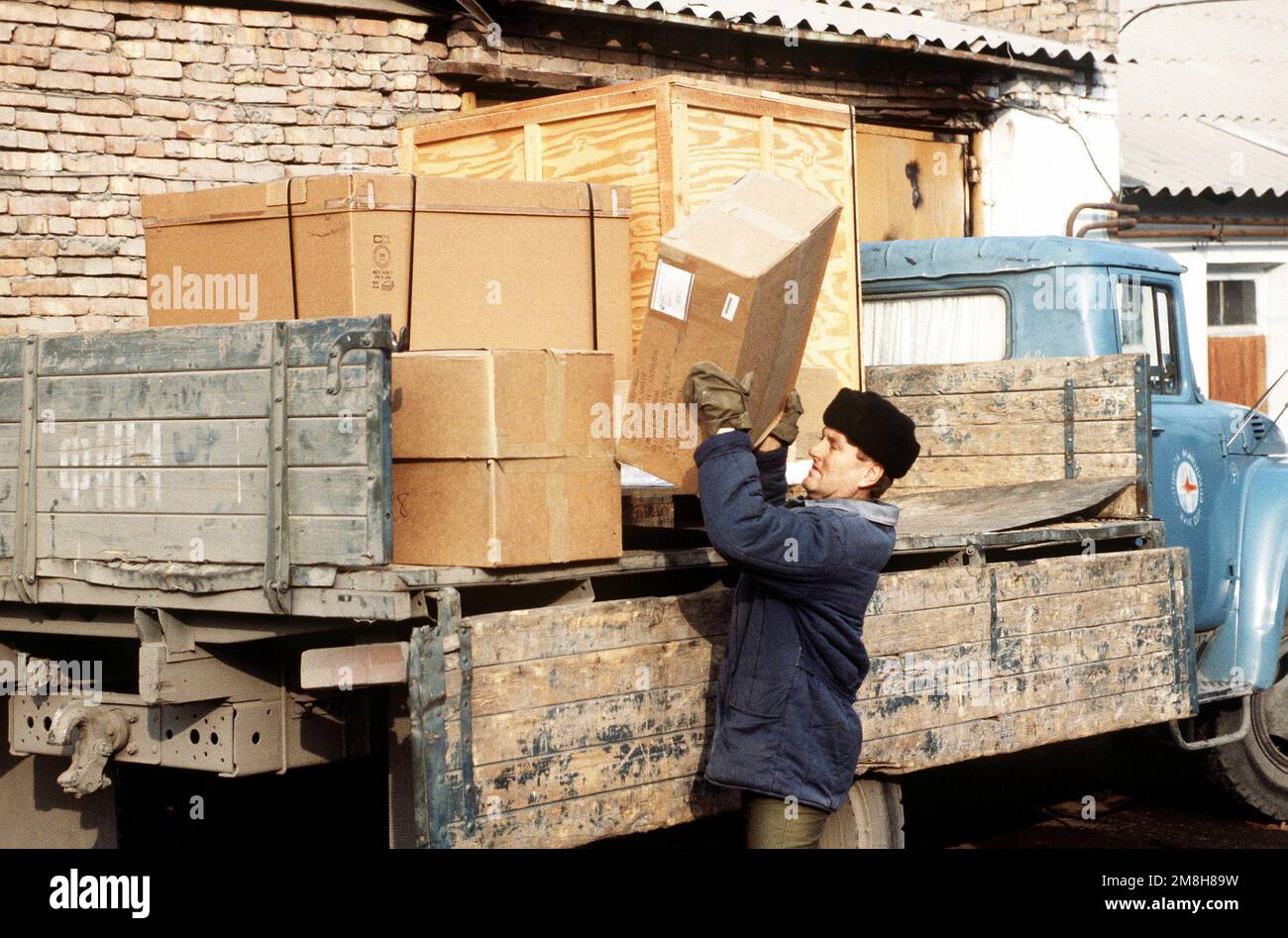 An employee from the Republican Hospital unloads supplies being ...