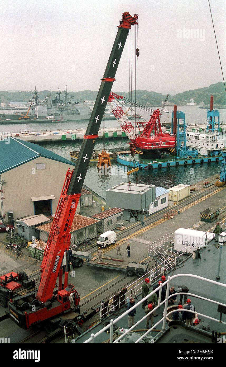 A heavy lift crane is used to lower the Mark 25 Sea Sparrow basic point ...