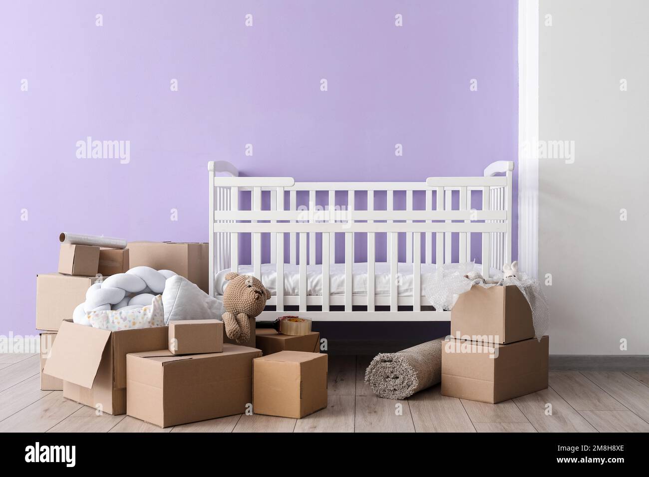 Baby in box crib hi-res stock photography and images - Alamy