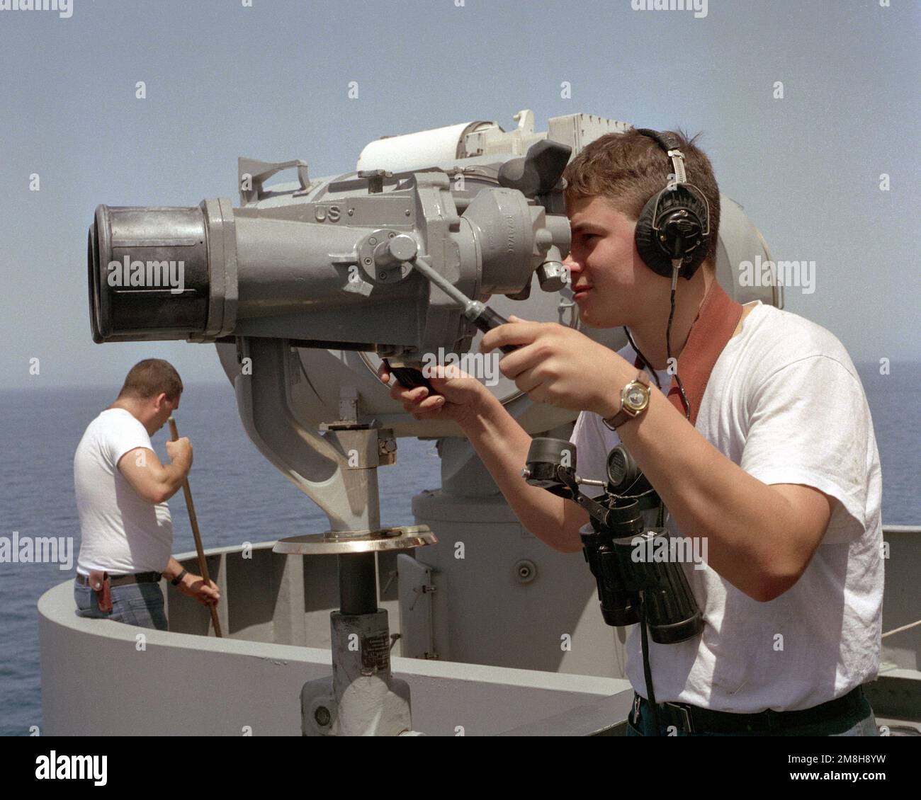 SEAMAN Apprentice Justin McEvers of the 3rd Division uses the ship's ...