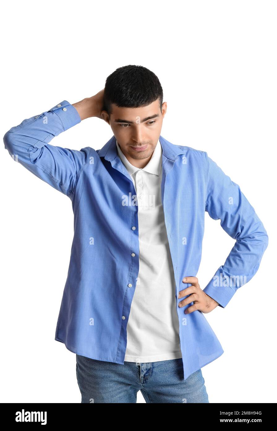 Thoughtful young man on white background Stock Photo - Alamy