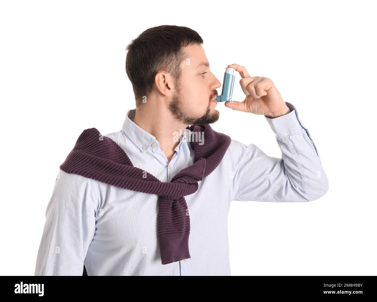 Man with inhaler isolated on white Stock Photo - Alamy