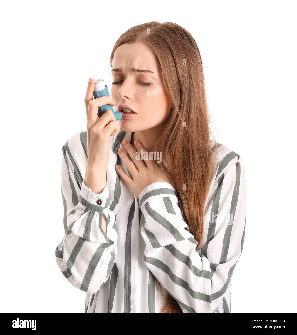 Sick young woman with inhaler on white background Stock Photo - Alamy
