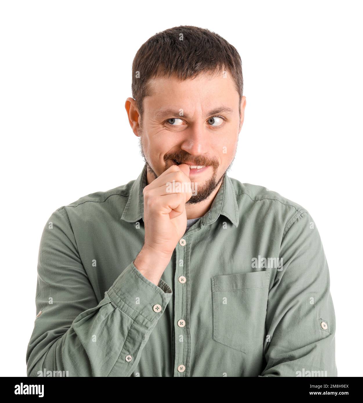 Excited young man biting hi-res stock photography and images - Alamy