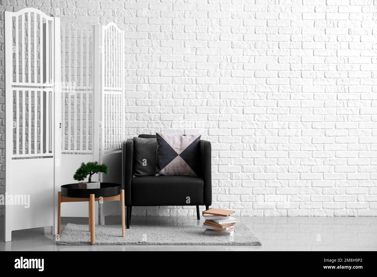 Interior of modern room with stylish folding screen Stock Photo - Alamy