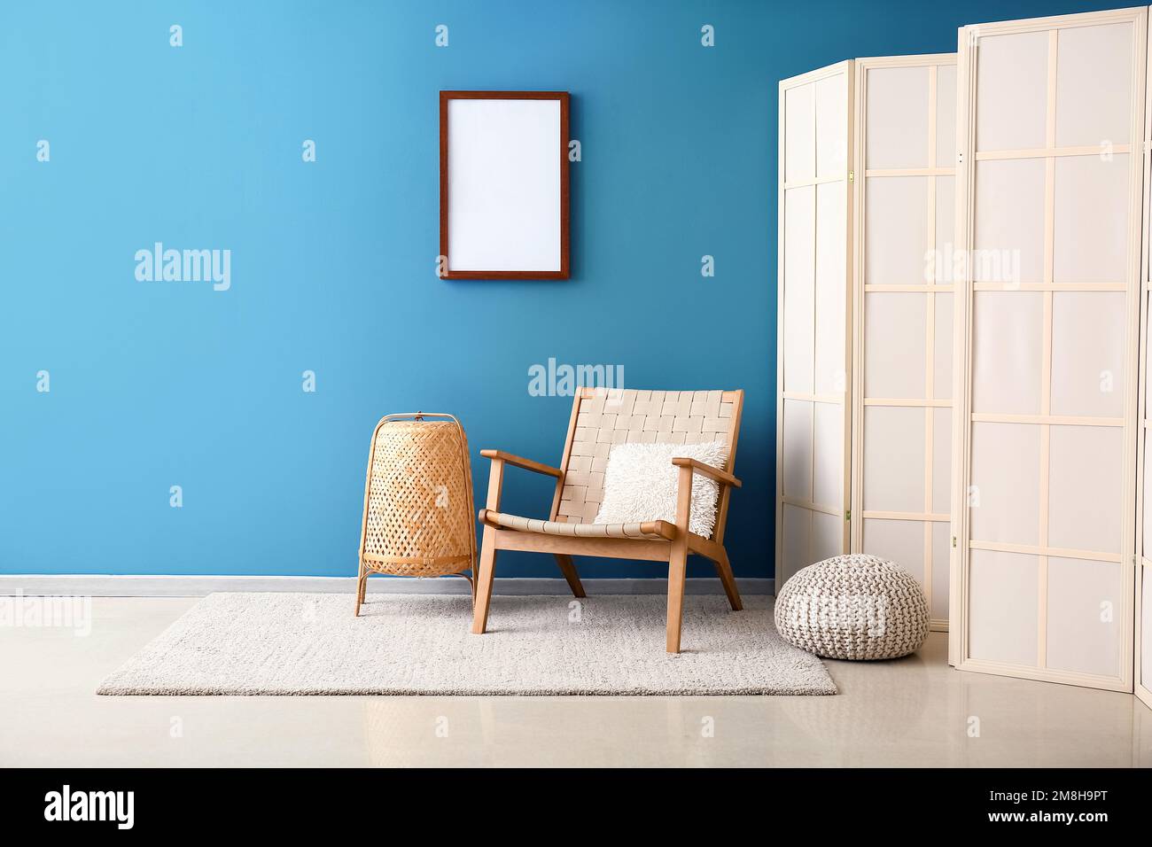 Interior of modern room with stylish folding screen Stock Photo - Alamy