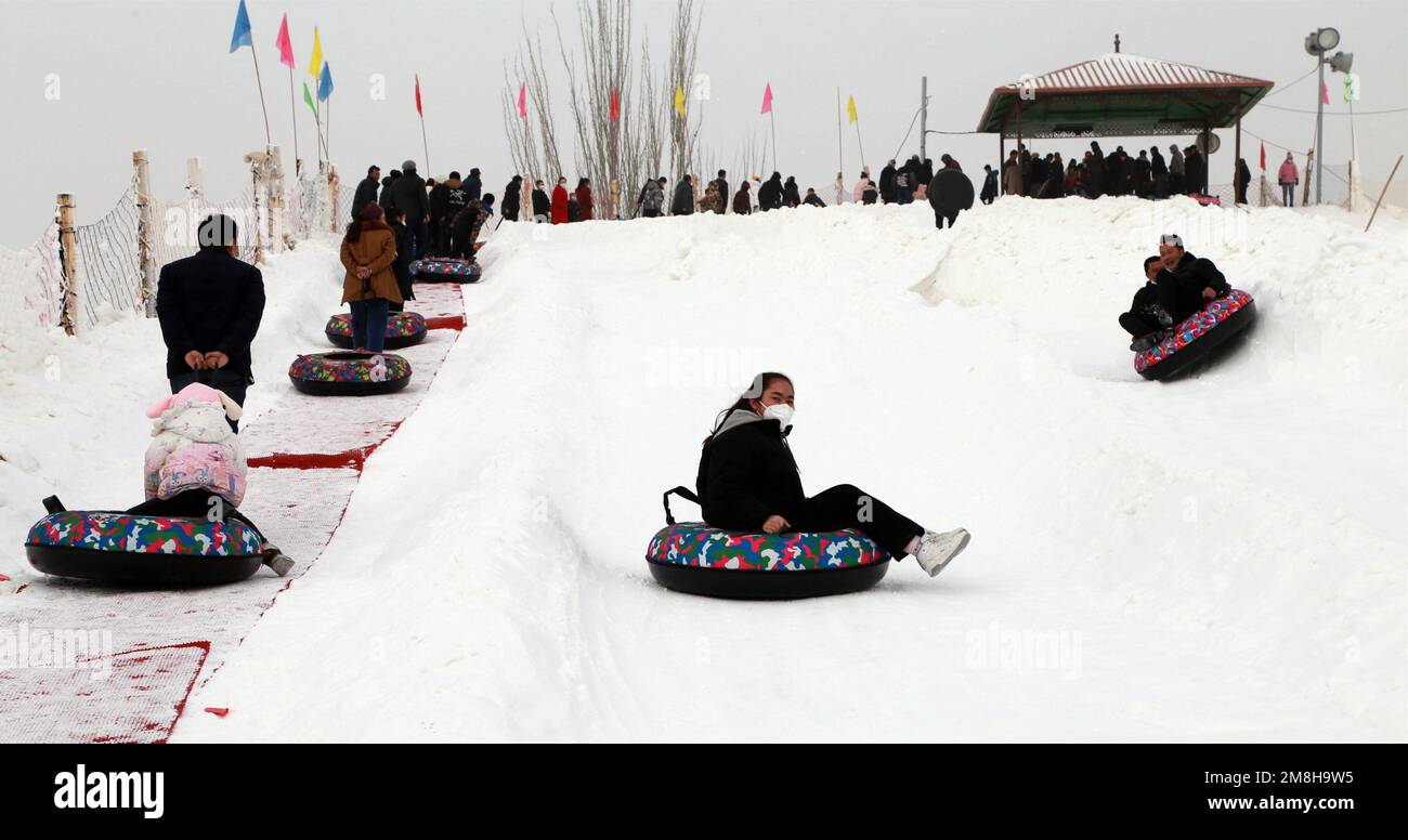 AKSU, CHINA - JANUARY 14, 2023 - Tourists experience skiing at a ski ...