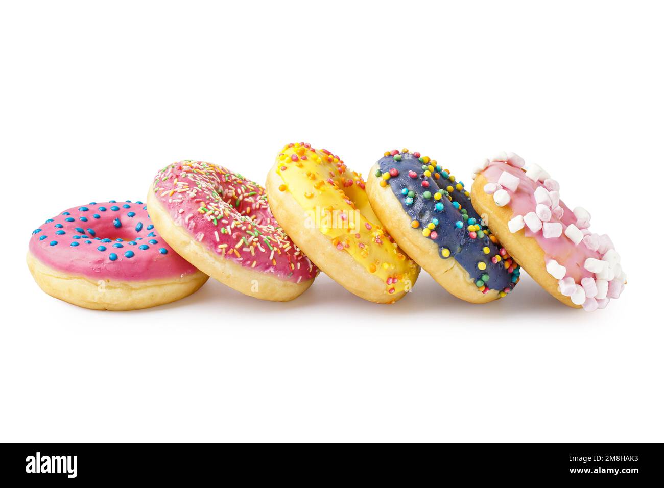 Row of sweet donuts on white background Stock Photo - Alamy