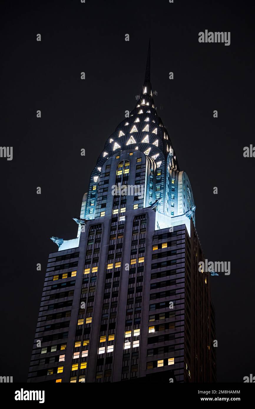 A low-angle vertical of Chrystler Building night view in New York Stock ...