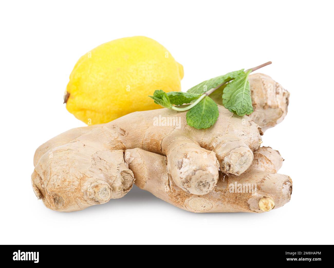 Fresh ginger roots and lemon on white background Stock Photo - Alamy