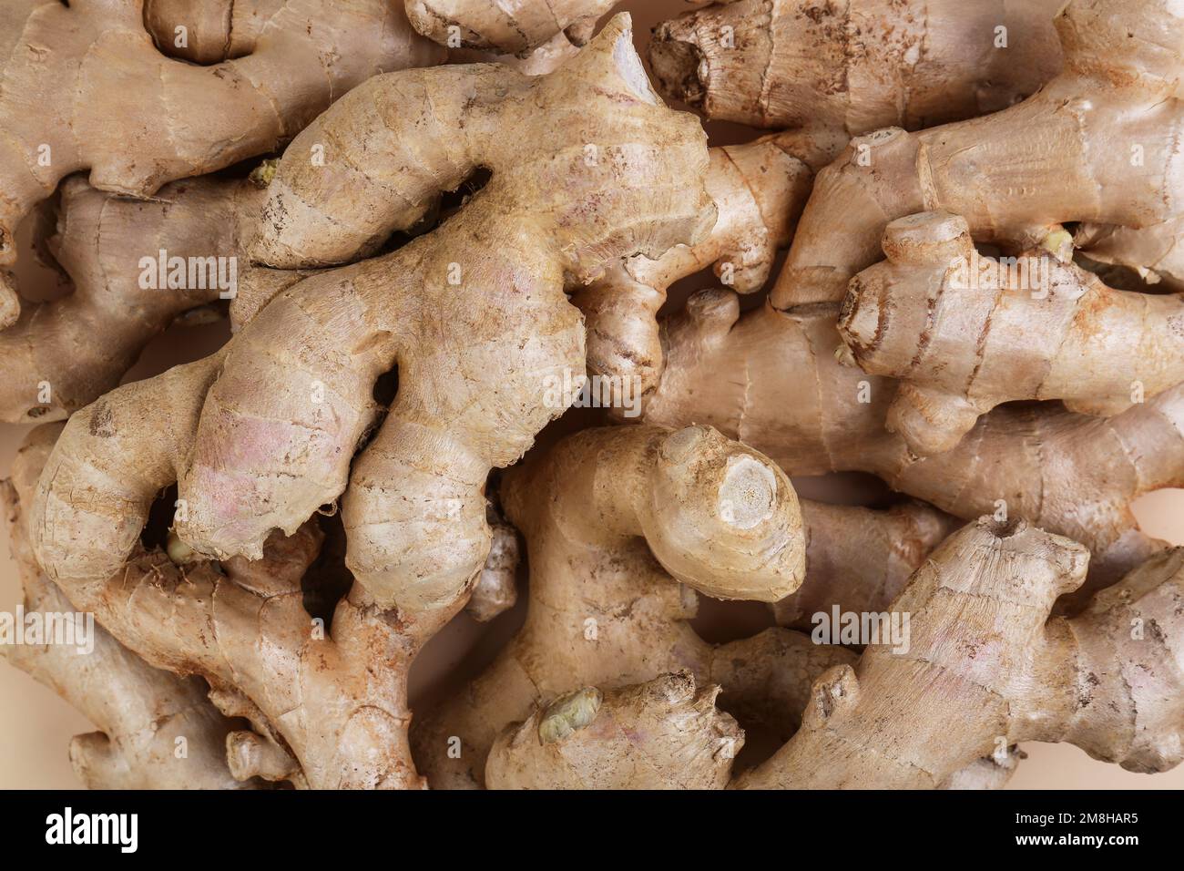 Texture of fresh ginger as background Stock Photo - Alamy