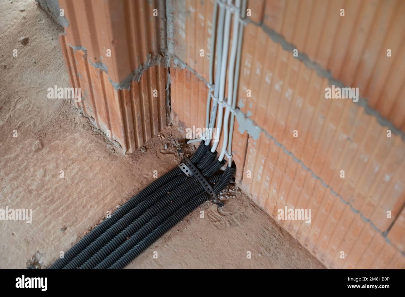 cable canal for eletric installation at the construction site with red ...