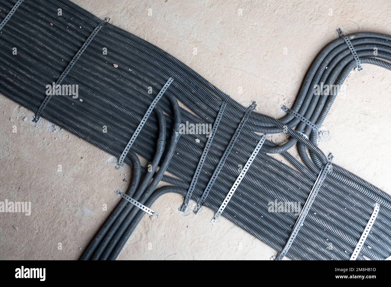 cable canal for eletric installation at the construction site with red ...