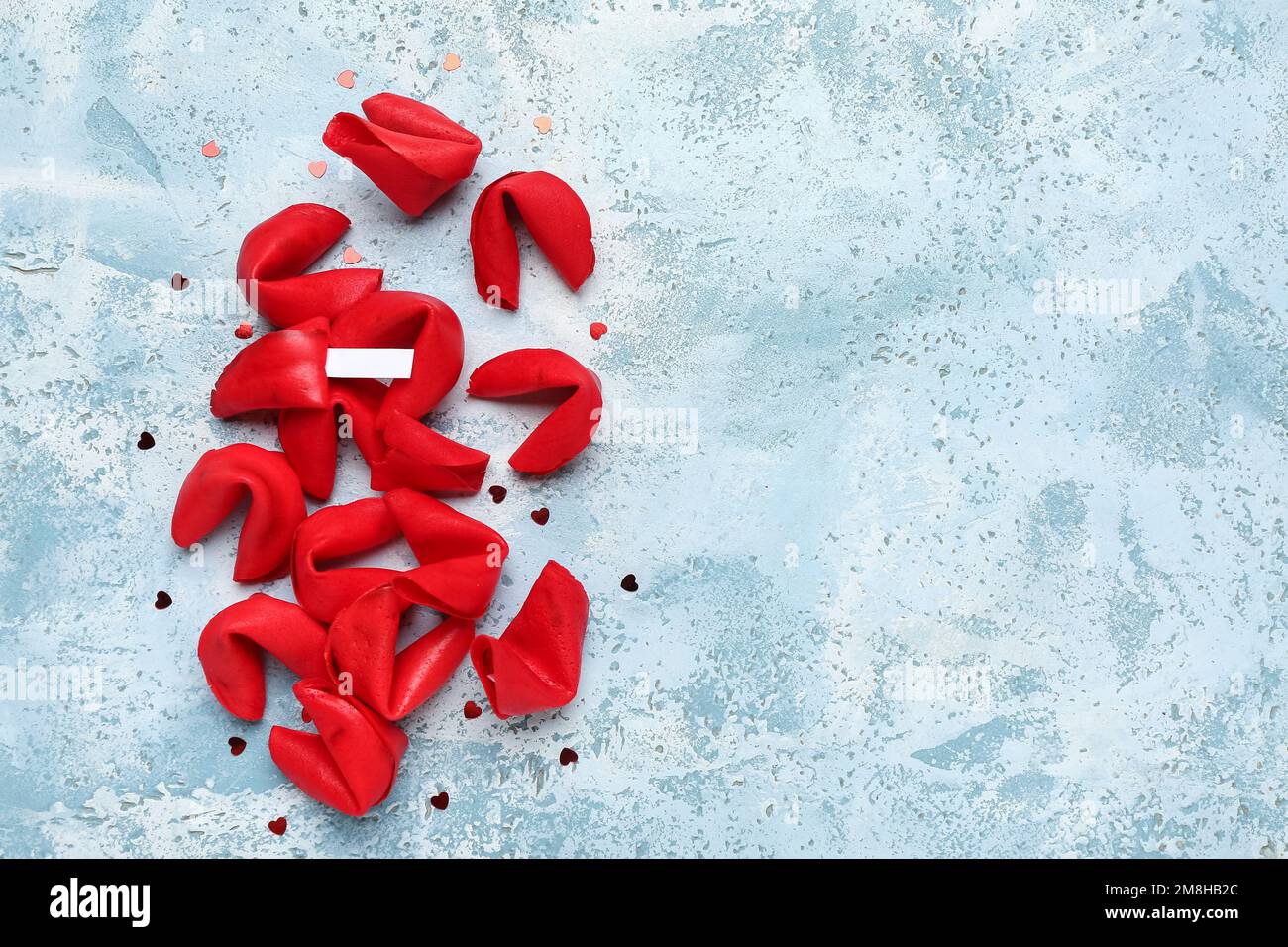 Red fortune cookies with hearts on grunge background. Valentine's Day ...