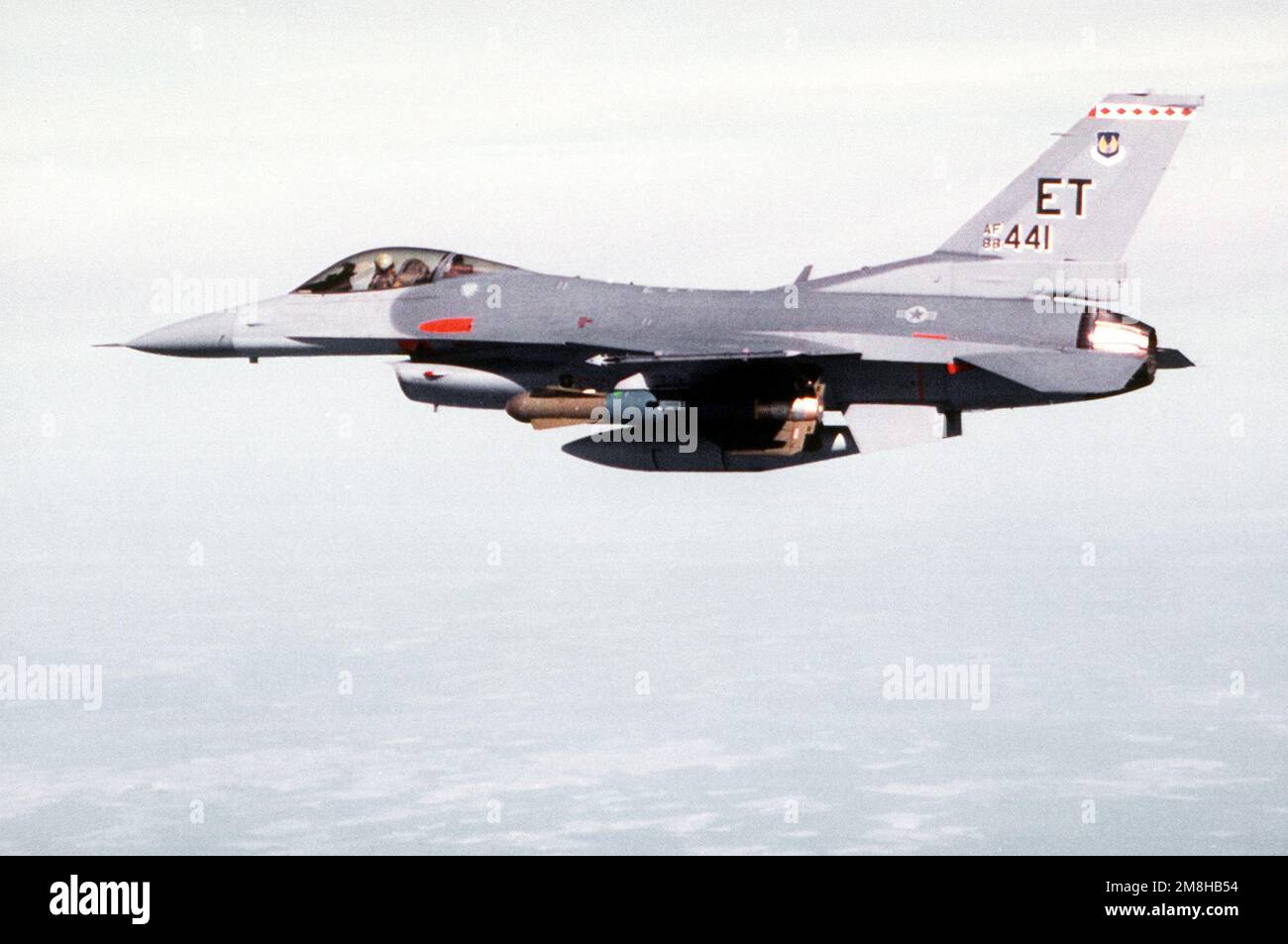 Air to air view of a GBU-15 air launched glide bomb on an F-16 Fighting ...