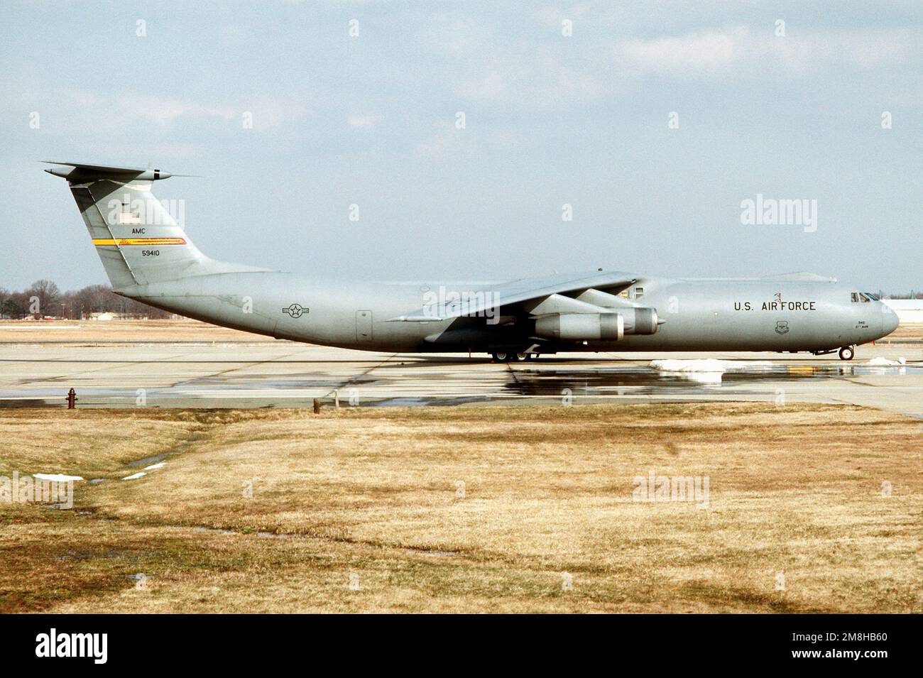 A right side view of a 97th Avionics Maintenance Wing (97th AMW) C-141B ...