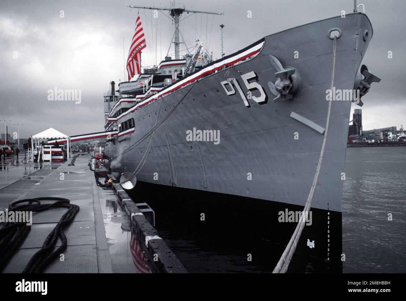 A starboard bow view of the destroyer tender USS PRAIRIE (AD-15) moored ...