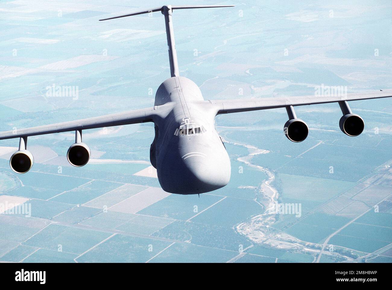 Air-to-air, front view of a 60th Airlift Wing C-5B Galaxy airlifter ...