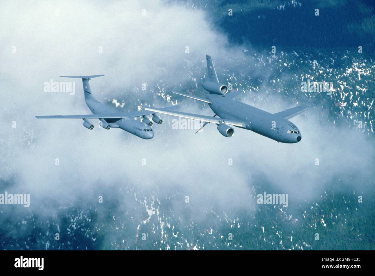 Air-to-air, side view of a 22nd Air Refueling Wing KC-10A Extender from ...