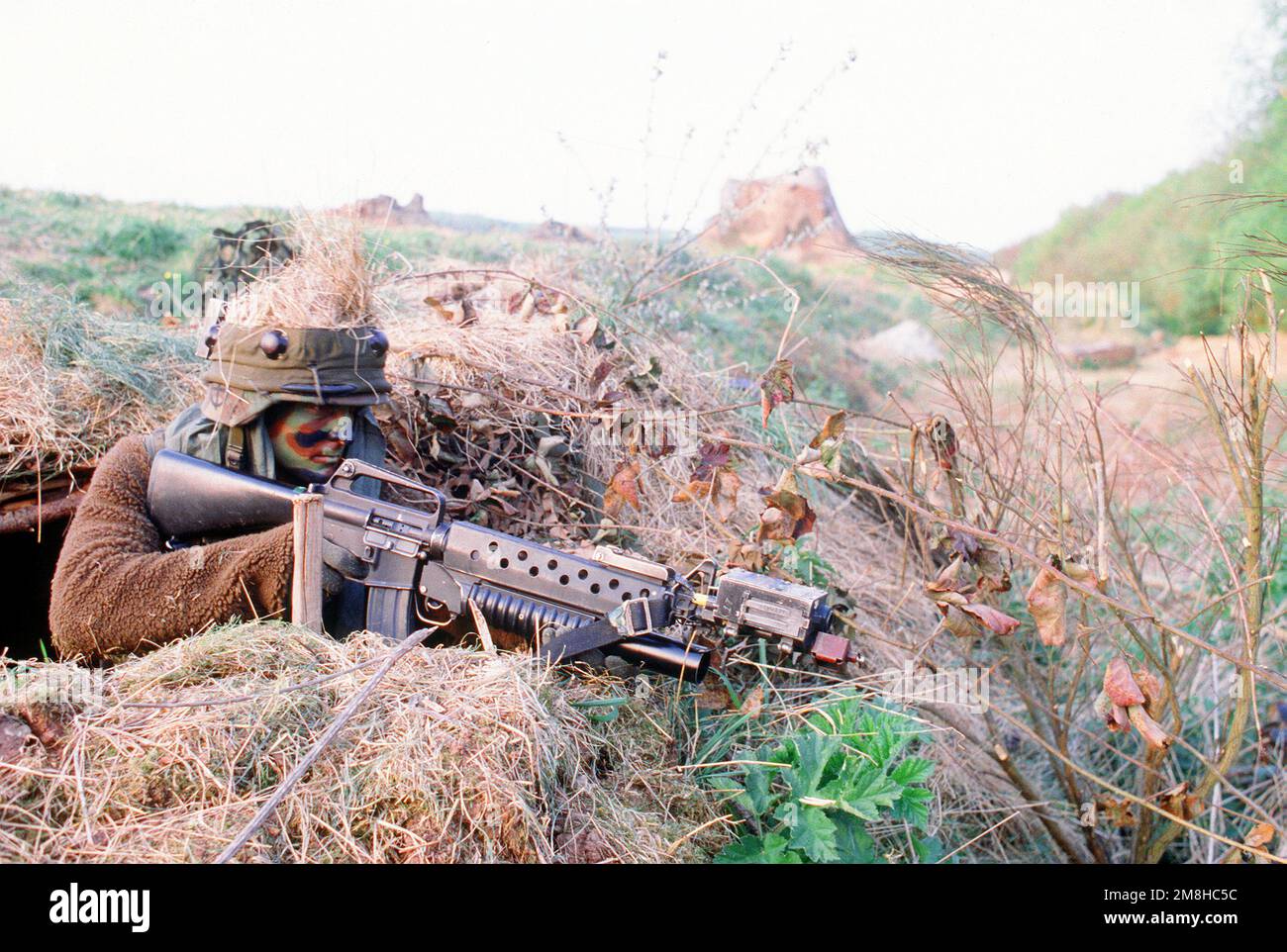 A heavily camouflaged SENIOR AIRMAN Eric Chambers, 100th Security ...
