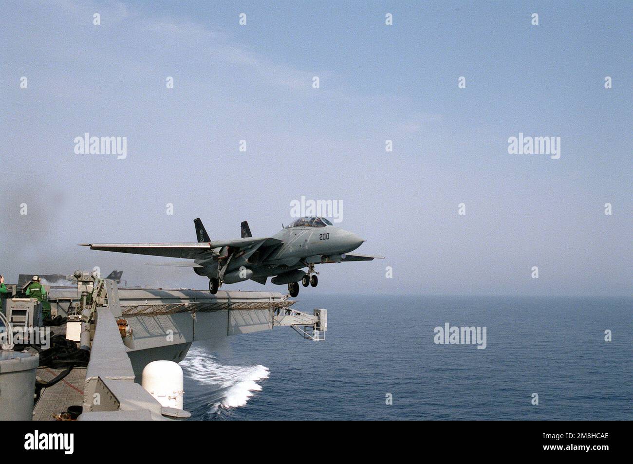 A Fighter Squadron 84 (VF-84) F-14A Tomcat aircraft is launched from ...