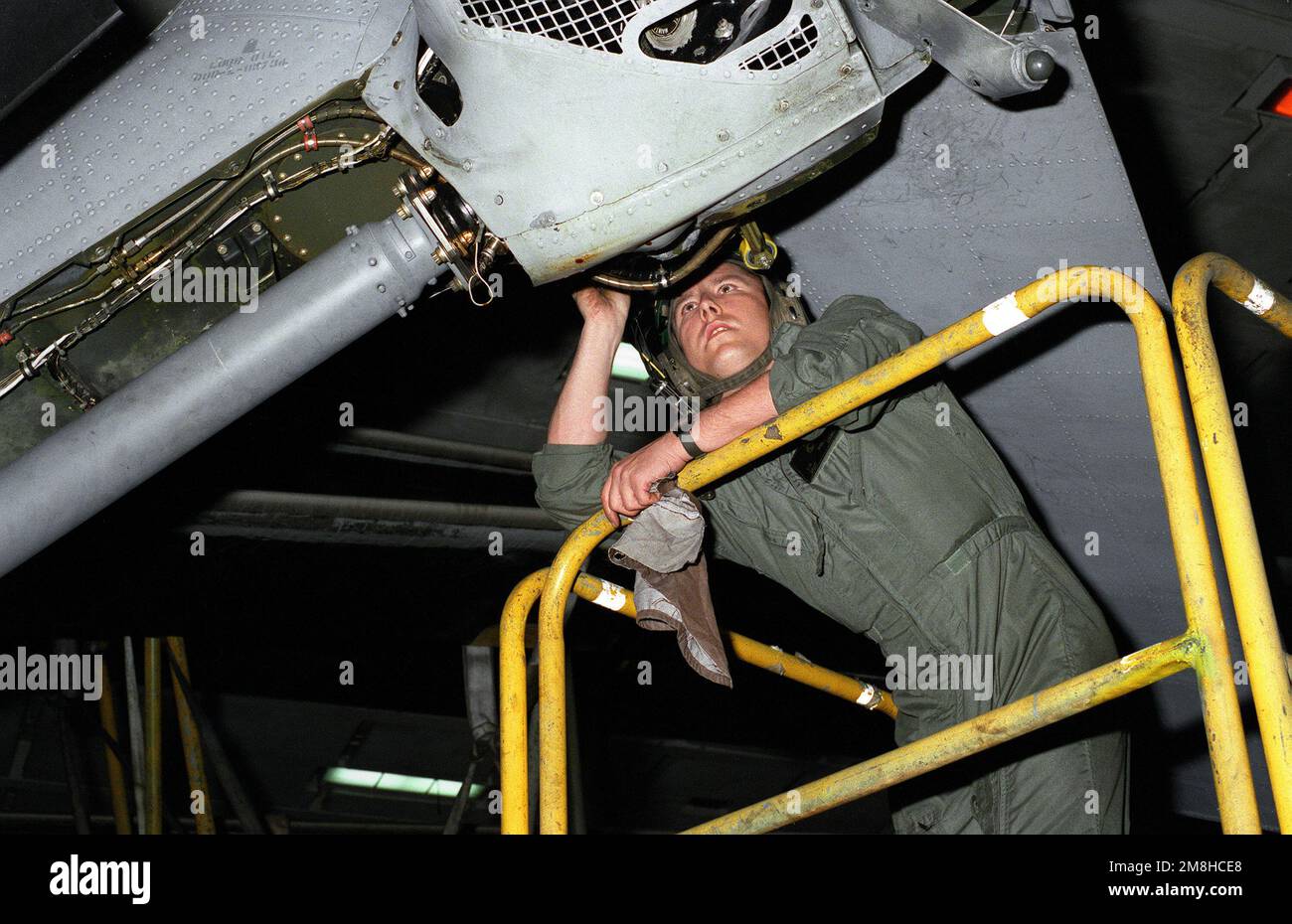 STAFF SGT. Sheppard inspects a tail rotor servo of a Marine Heavy ...