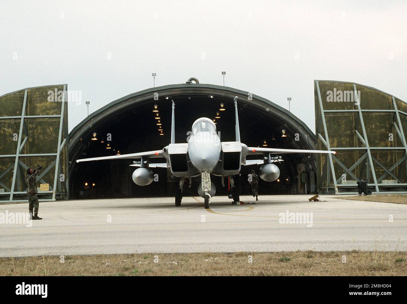 A 53rd Fighter Squadron F-15C Eagle aircraft stands in front of a ...