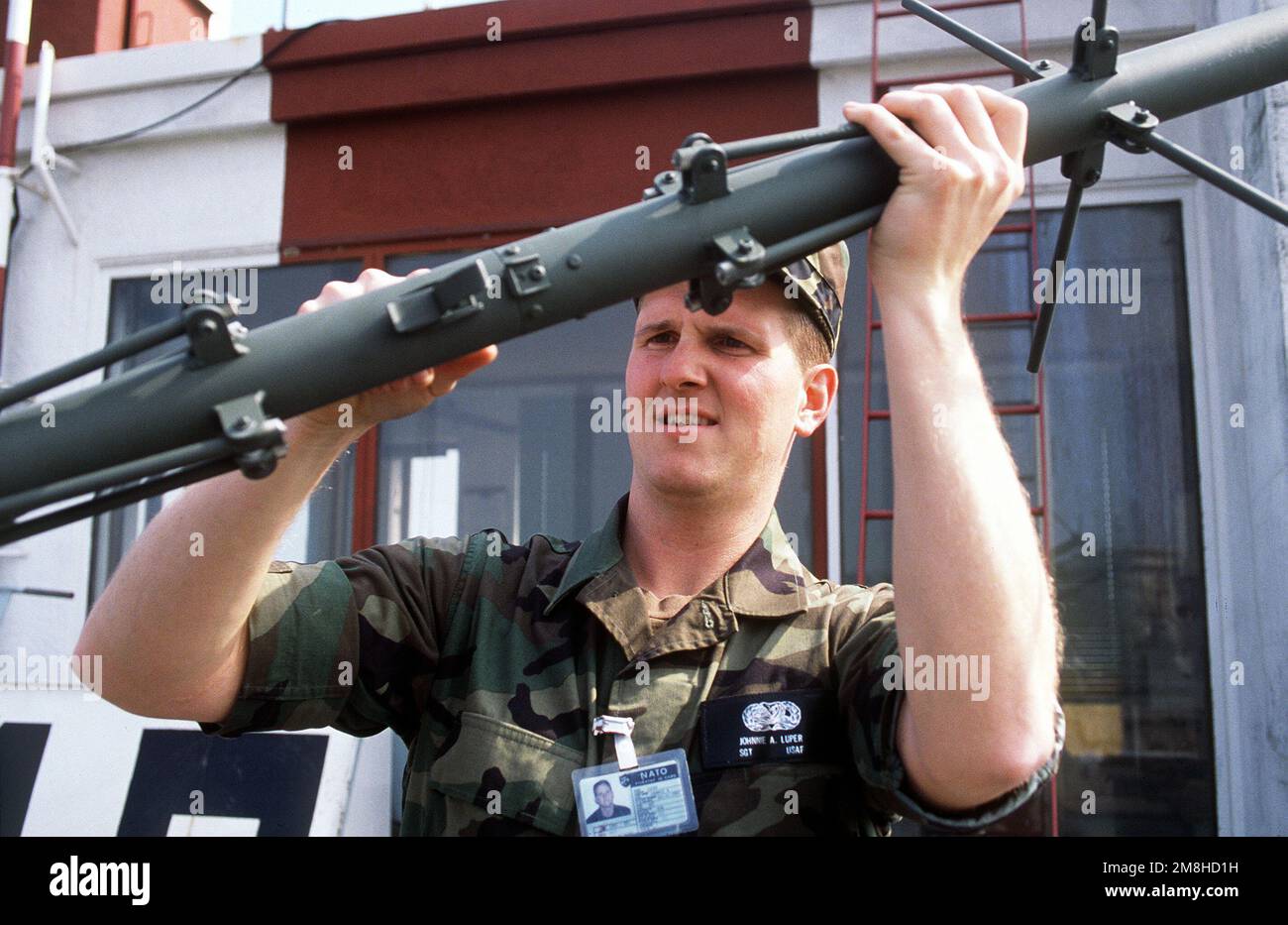 SGT. Johnnie Luper of the 1ST Combat Communications Squadron sets up a ...