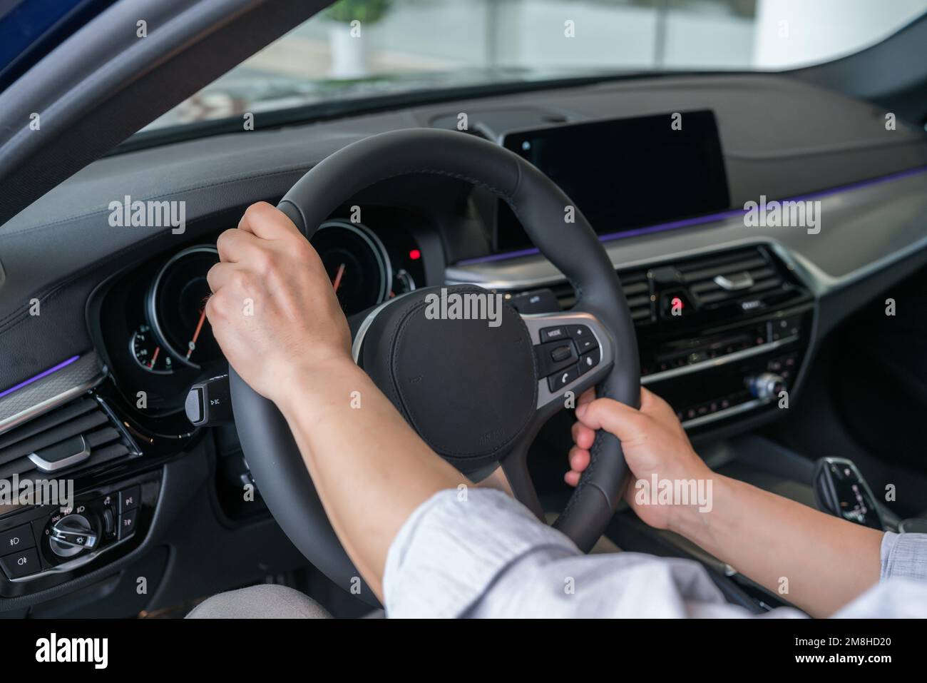 The old man test drive car Stock Photo - Alamy