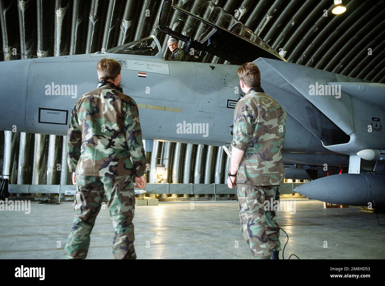 AIRMAN 1ST Class Ken O'Connor, crew chief, and STAFF SGT. Jerry Goins ...