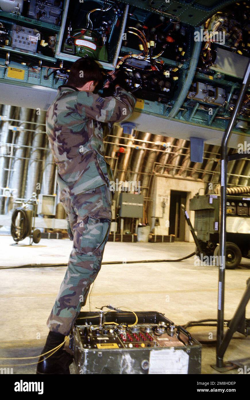 SENIOR AIRMAN Eddie Norris of the 36th Maintenance Squadron services a ...