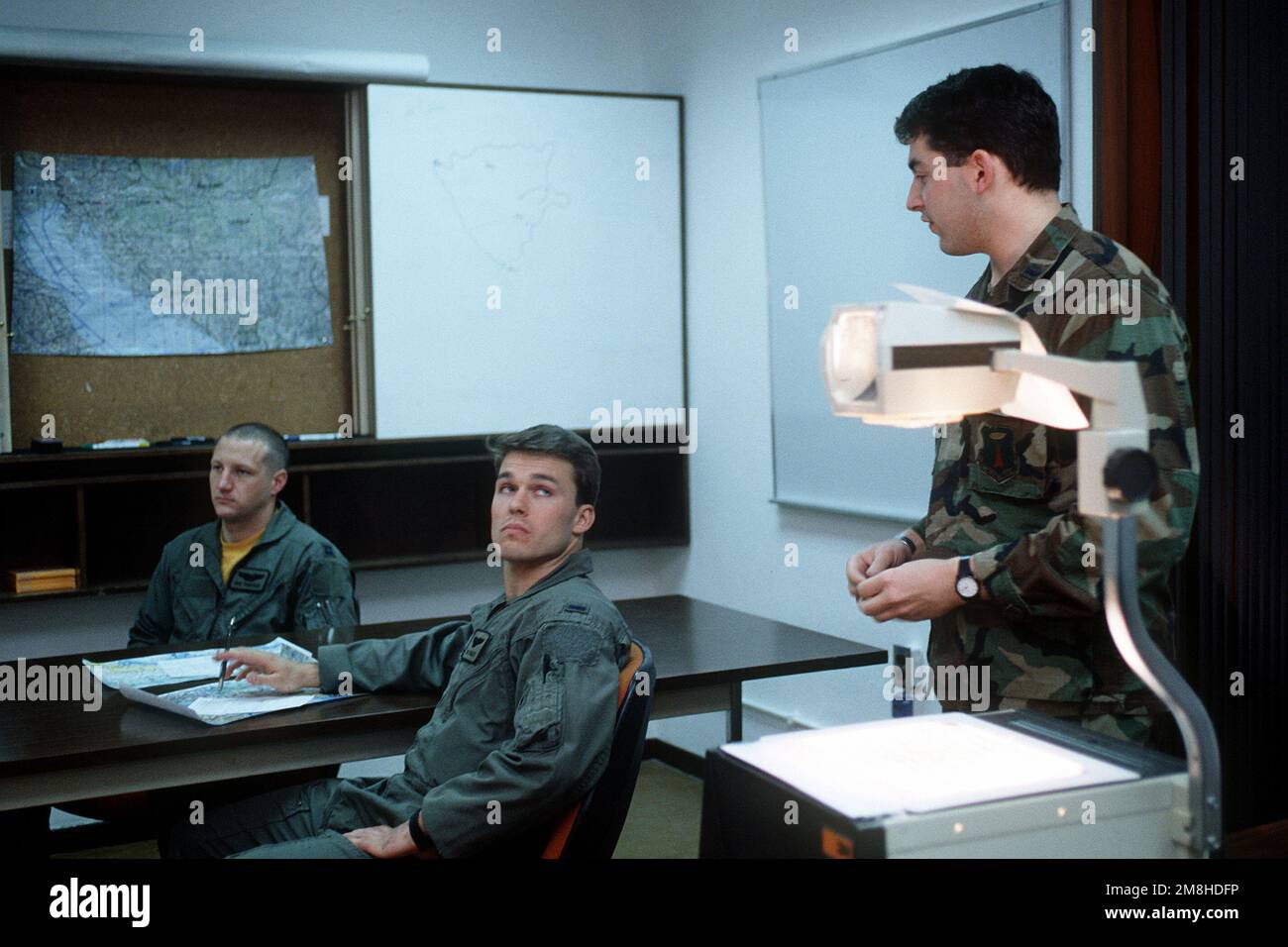 Two pilots from the 53rd Fighter Squadron receive an intelligence ...