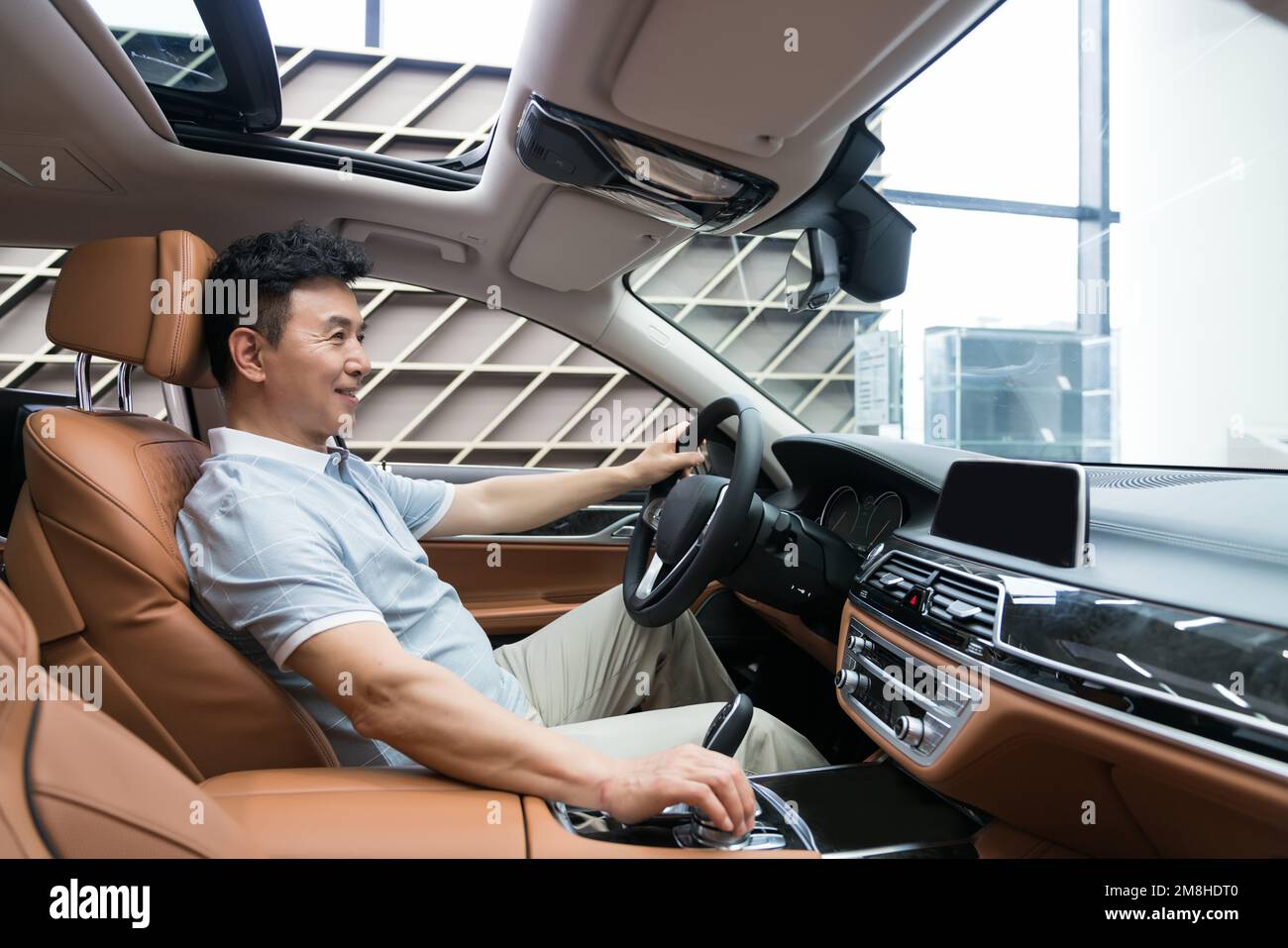 Business man drive a car Stock Photo - Alamy