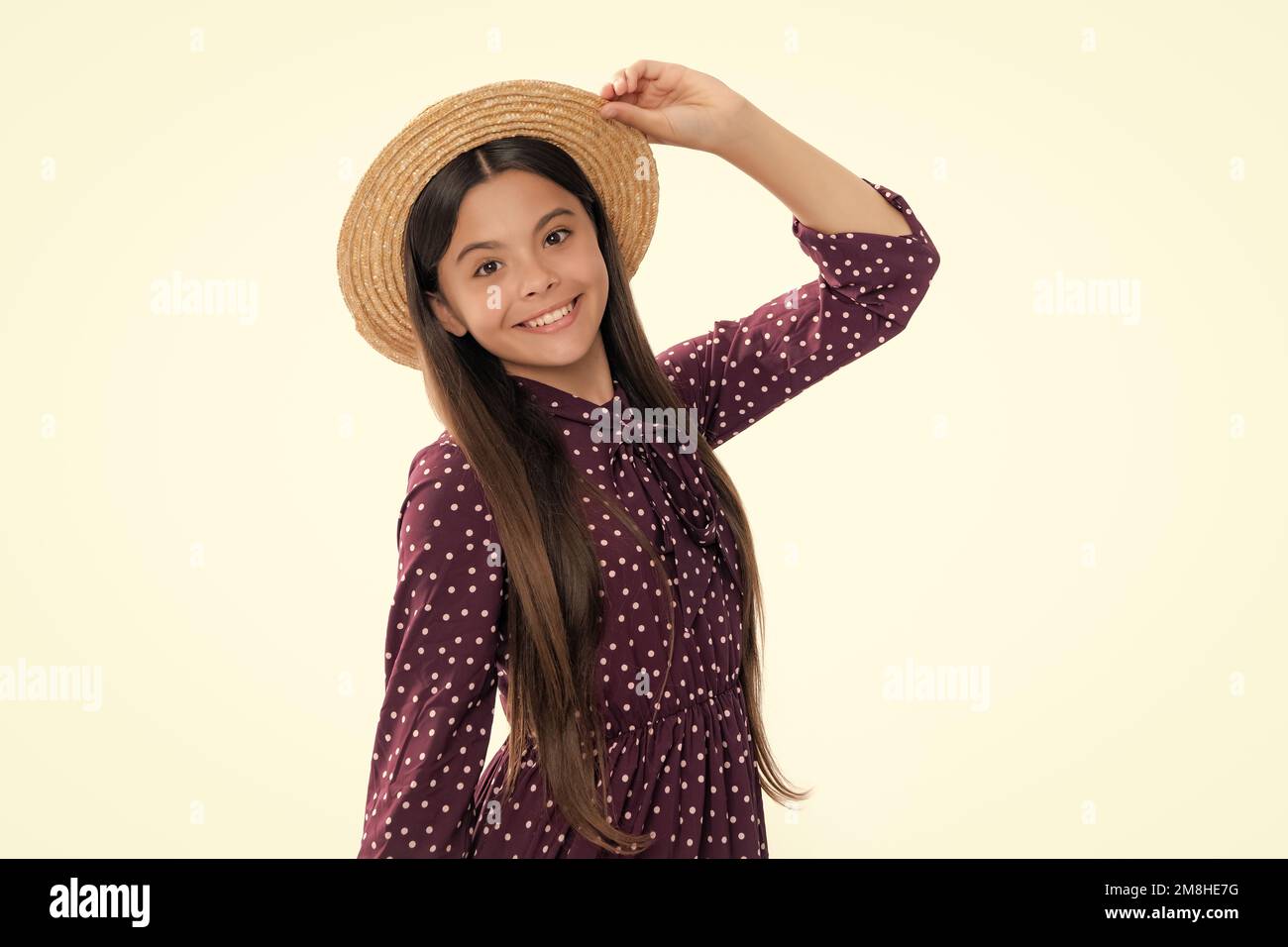 Portrait of happy smiling teenage child girl. Children studio portrait on white background ...