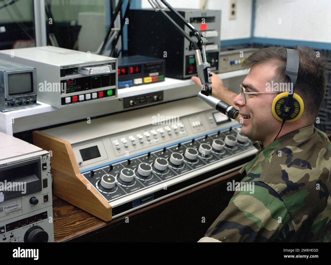 Marine SGT. Robert W. Beyer conducts his radio show for the Navy ...