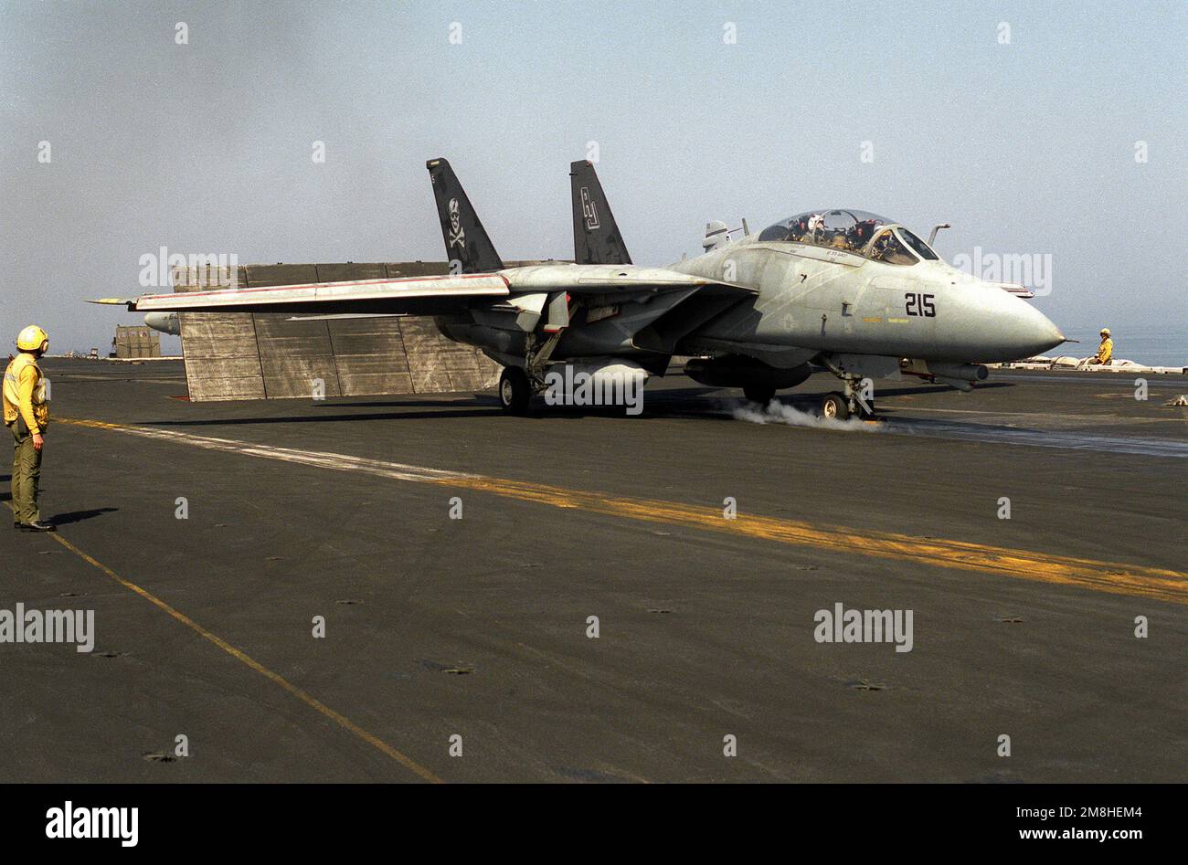 The catapult crew prepares to launch a Fighter Squadron 84 (VF-84) F ...