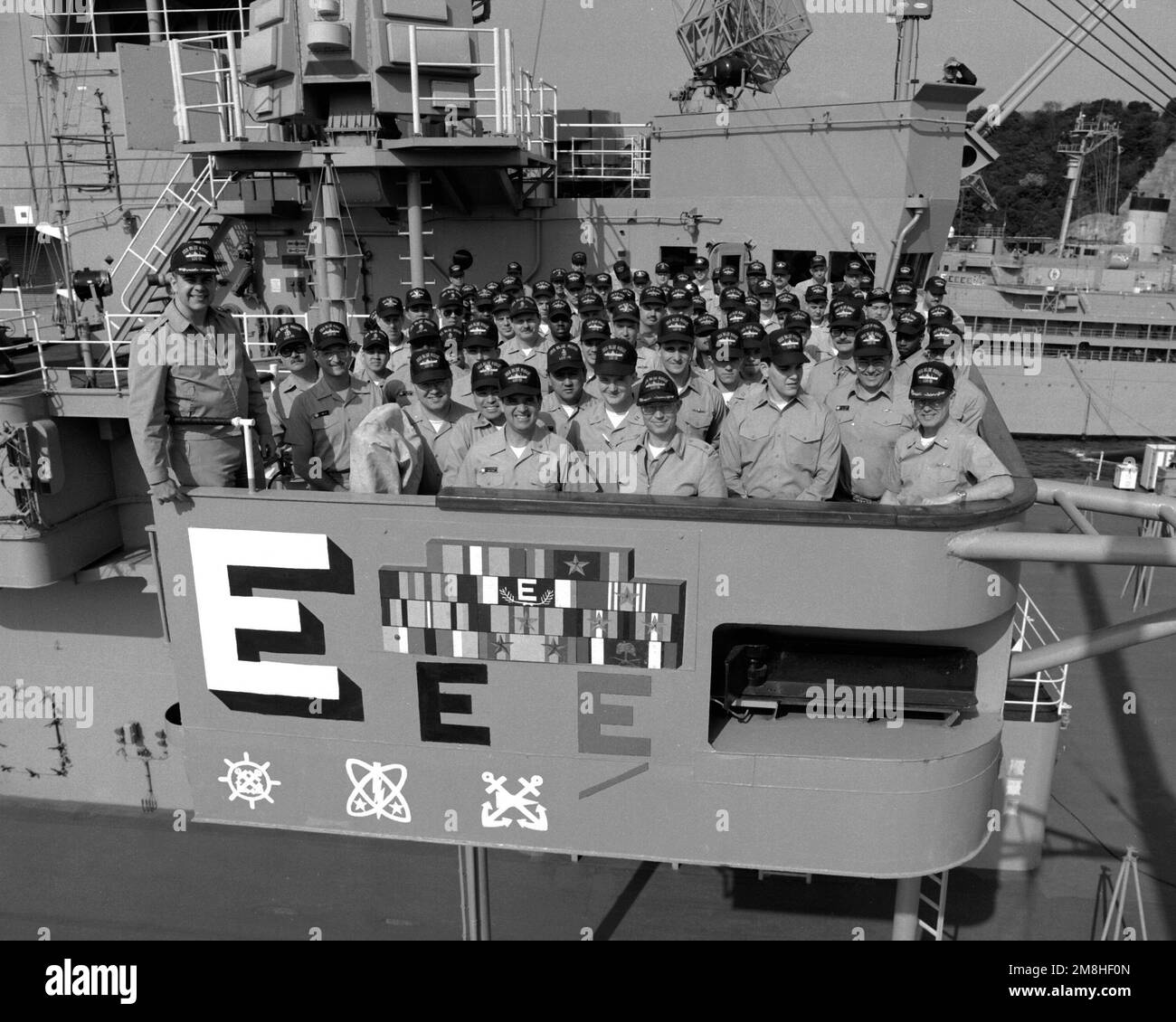 Officers and crew members of the amphibious command ship USS BLUE RIDGE ...