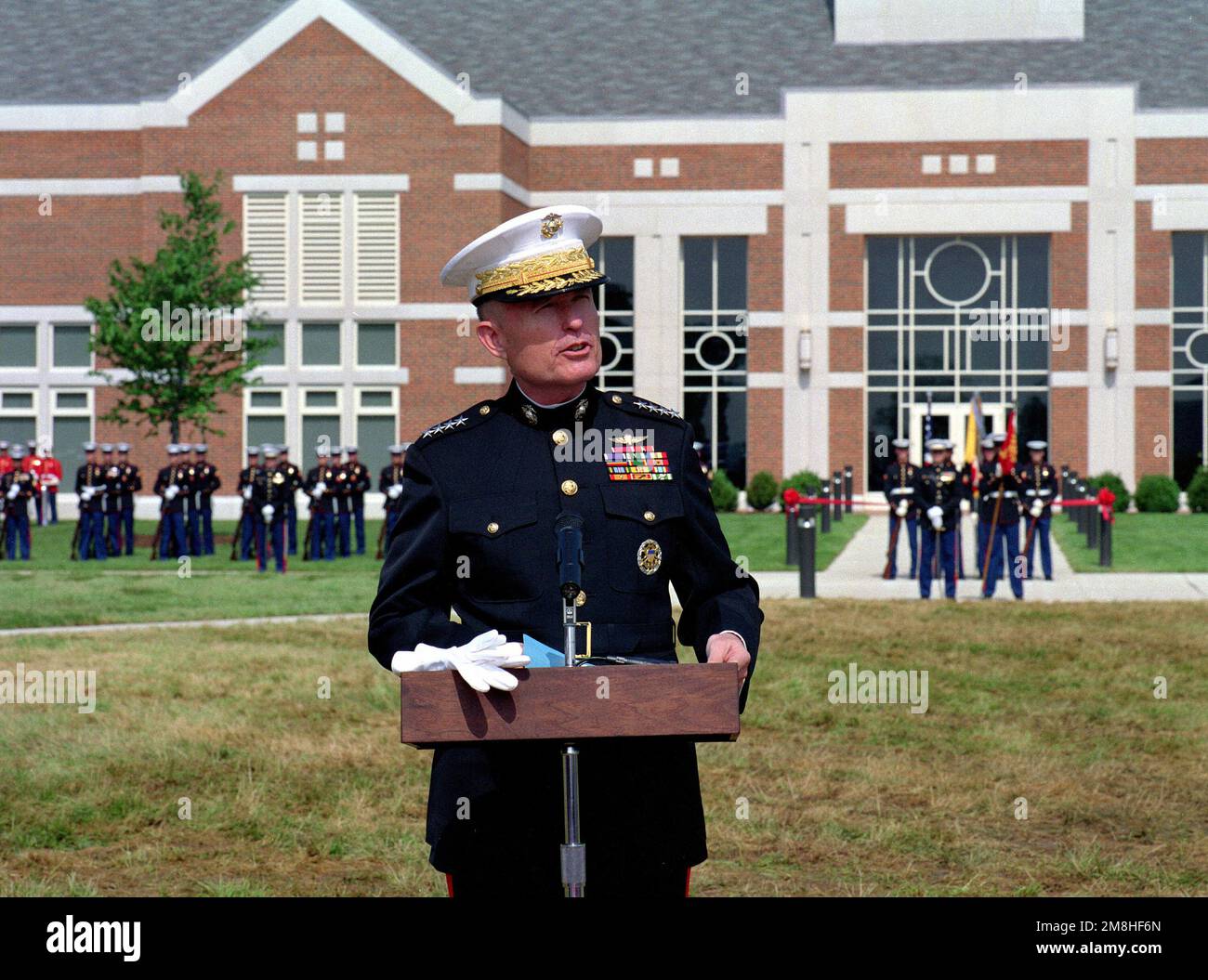 The Commandant of the Marine Corps, General Carl E. Mundy, wearing a ...