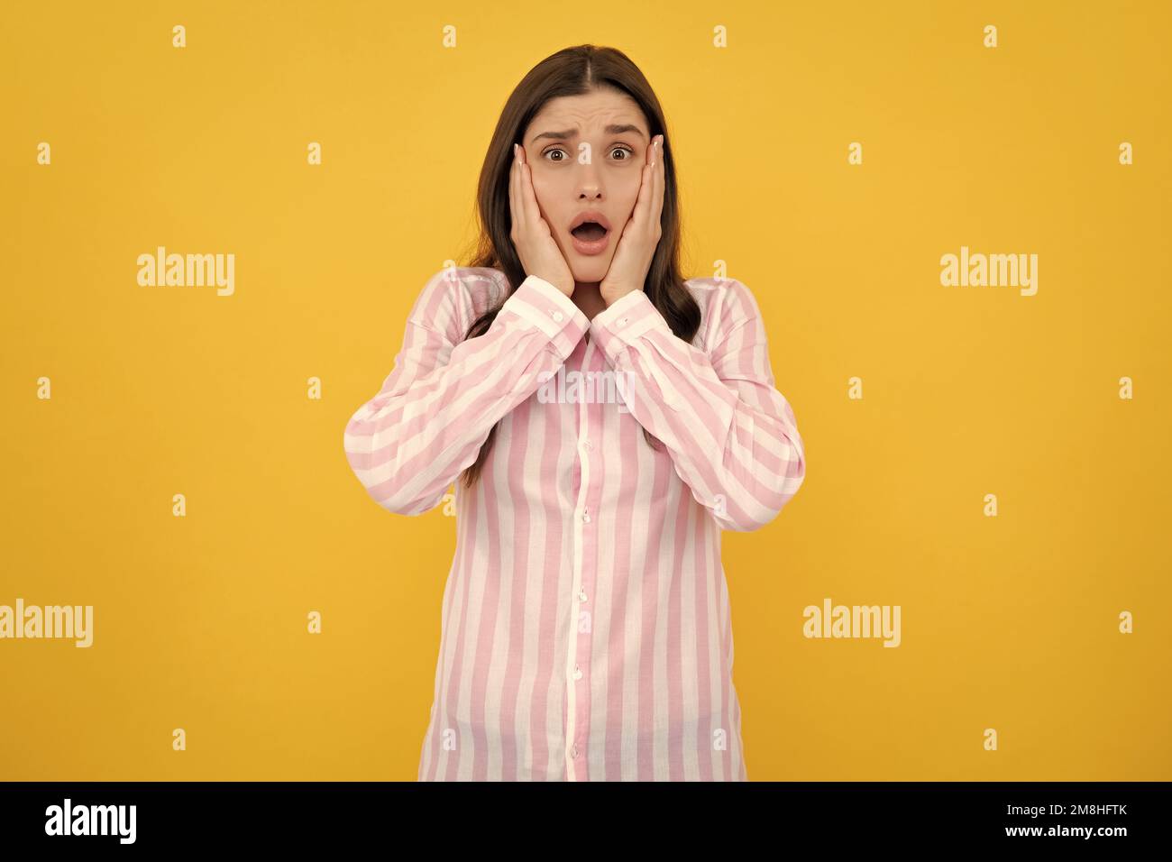 Surprised astonished young woman with open mouth. Excited female face ...