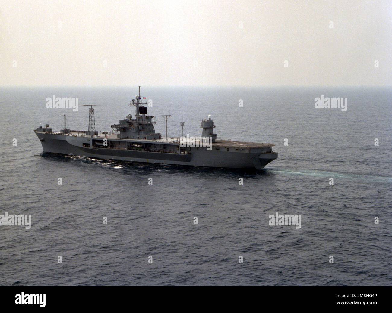 A port quarter view of the amphibious command ship USS BLUE RIDGE (LCC ...