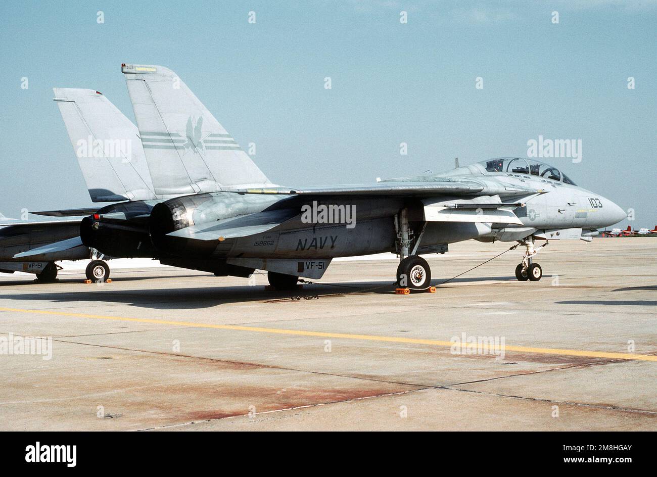 A right rear view of an F-14A Tomcat aircraft attached to Fighter ...
