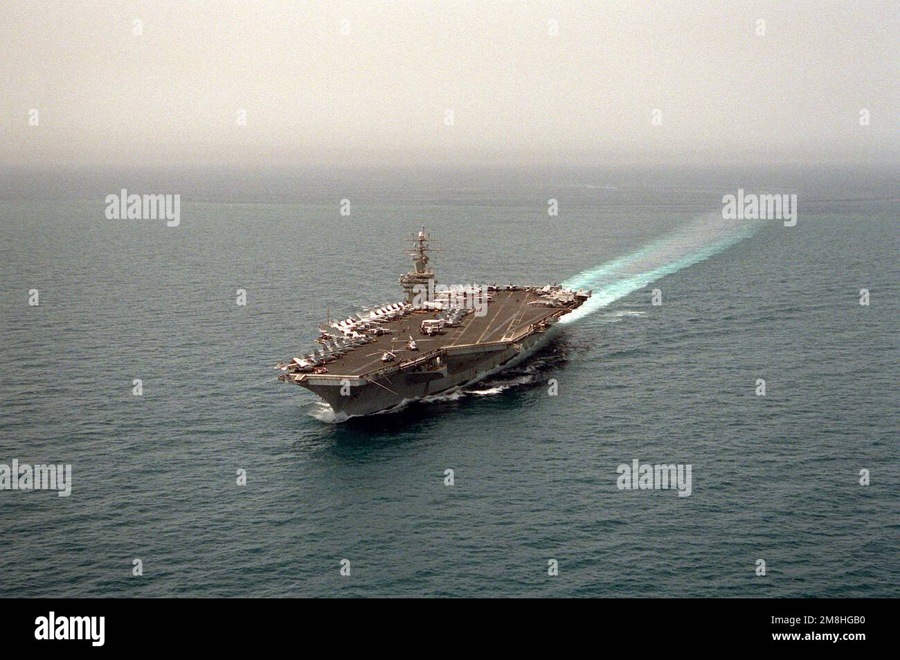 A port bow view of the nuclear-powered aircraft carrier USS NIMITZ (CVN ...