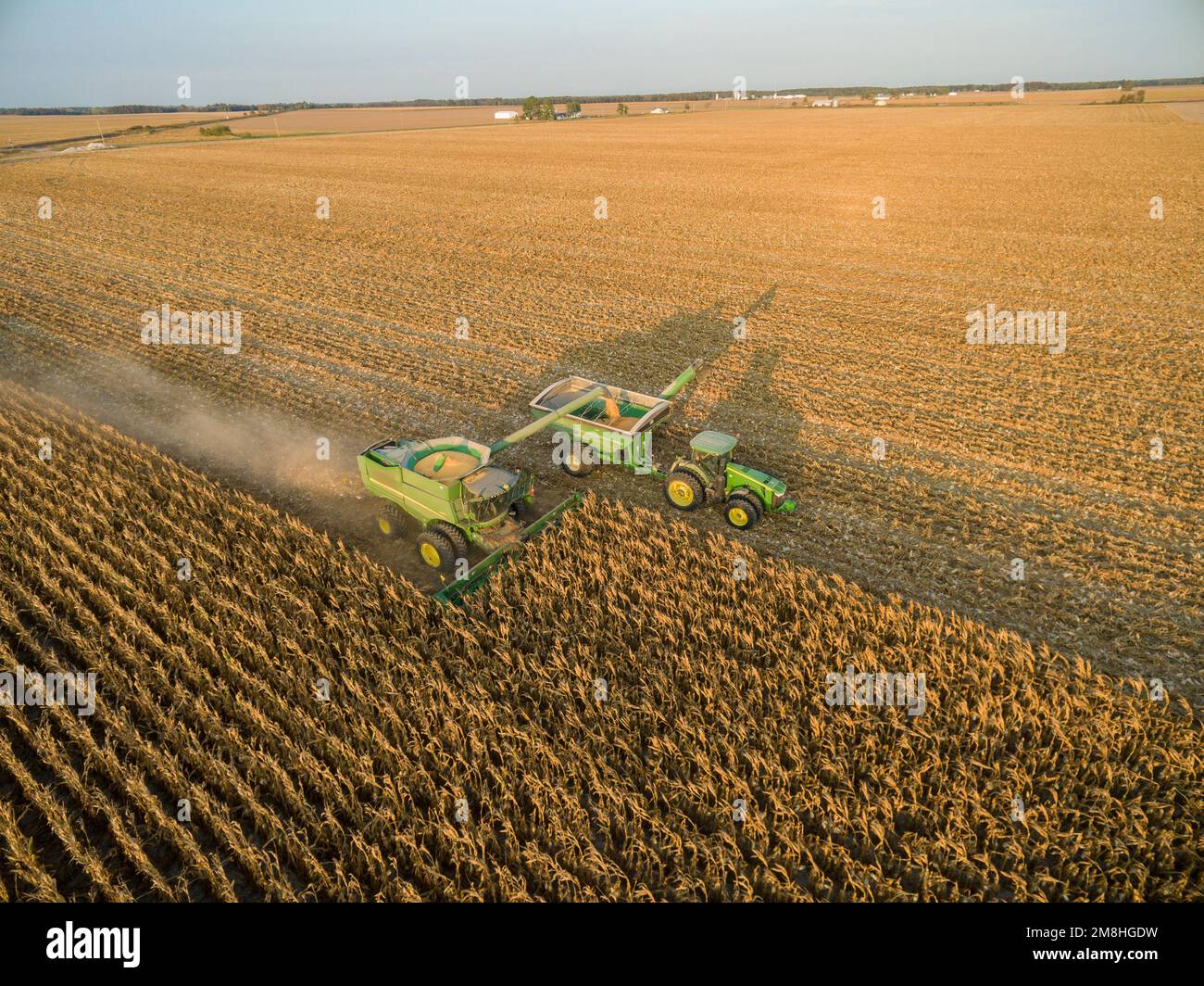 63801-08301 Corn Harvest, John Deere combine unloading corn into grain ...