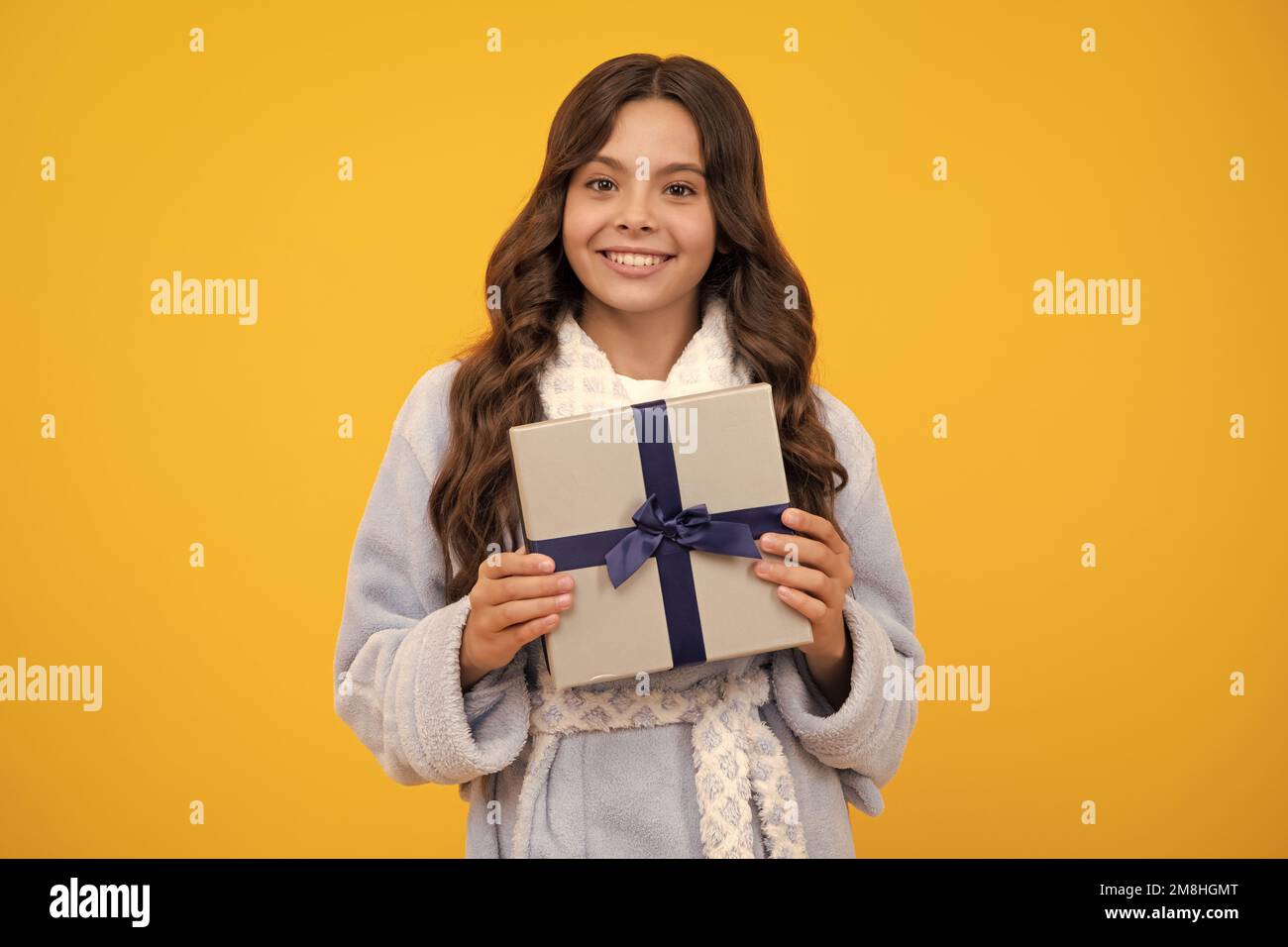 Portrait of teenager child girl 12, 13, 14, years old holding Christmas ...