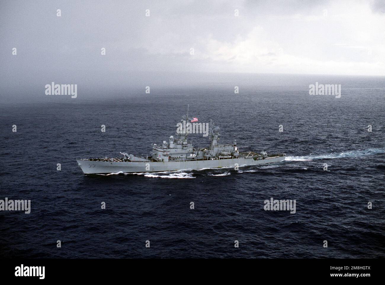 An bow view of the guided missile cruiser USS FOX (CG-33) underway. The ...
